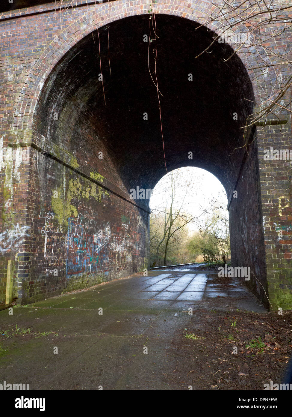 Arch over former salt line railway, now public footpath in Cheshire UK ...