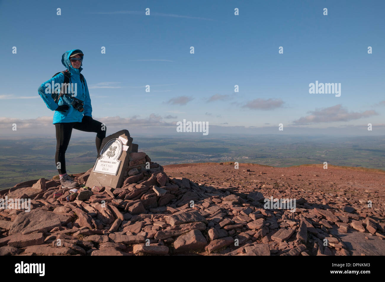 Hiker rests at summit of Pen Y Fan, South Wales' highest point ...