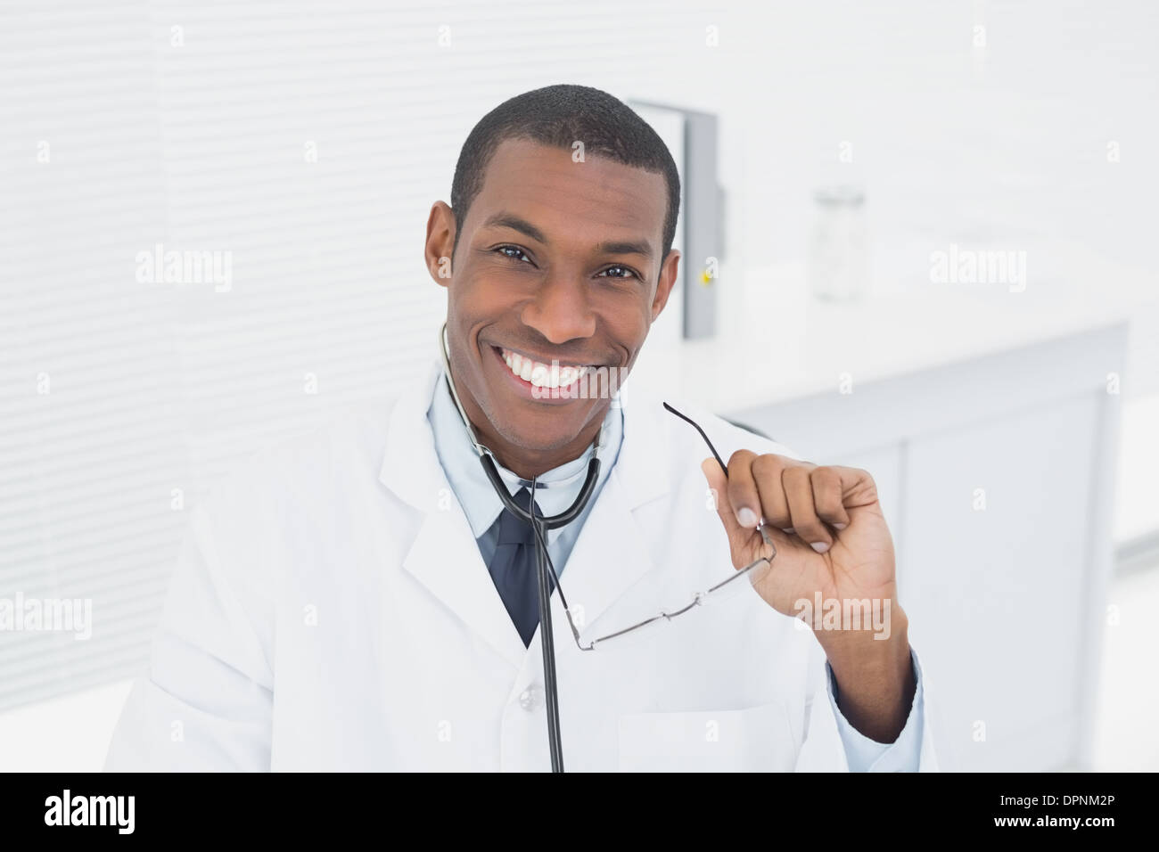 Portrait smiling doctor in black hi-res stock photography and images ...