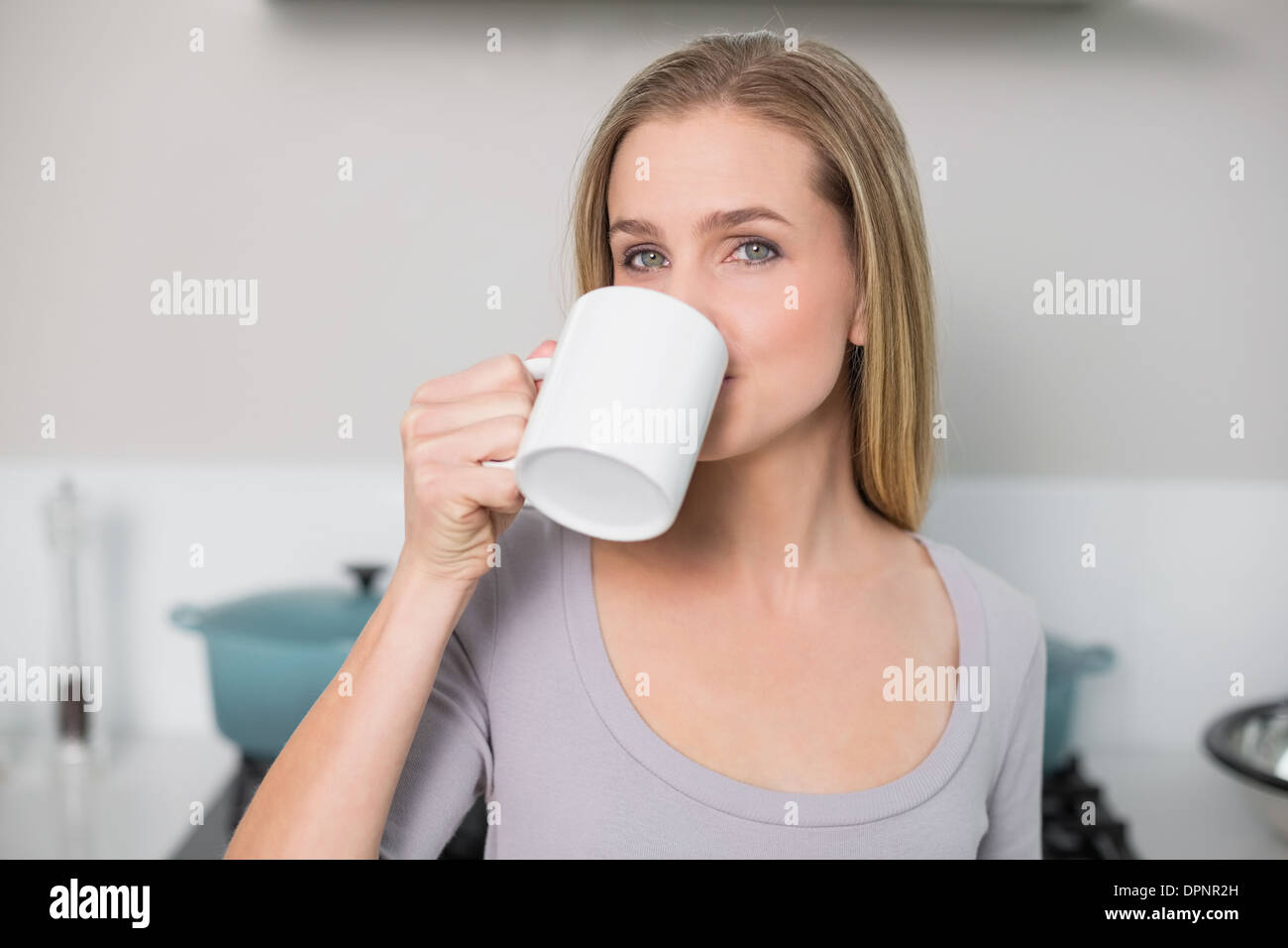 Model drinking from mug hi-res stock photography and images - Alamy