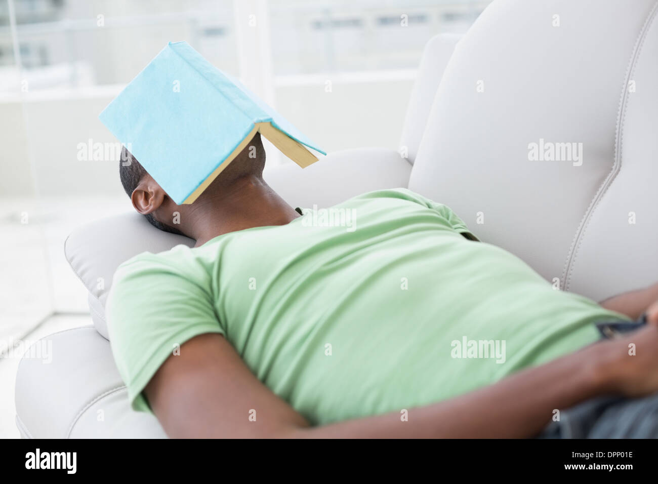 Man book sleeping on sofa hi-res stock photography and images - Alamy
