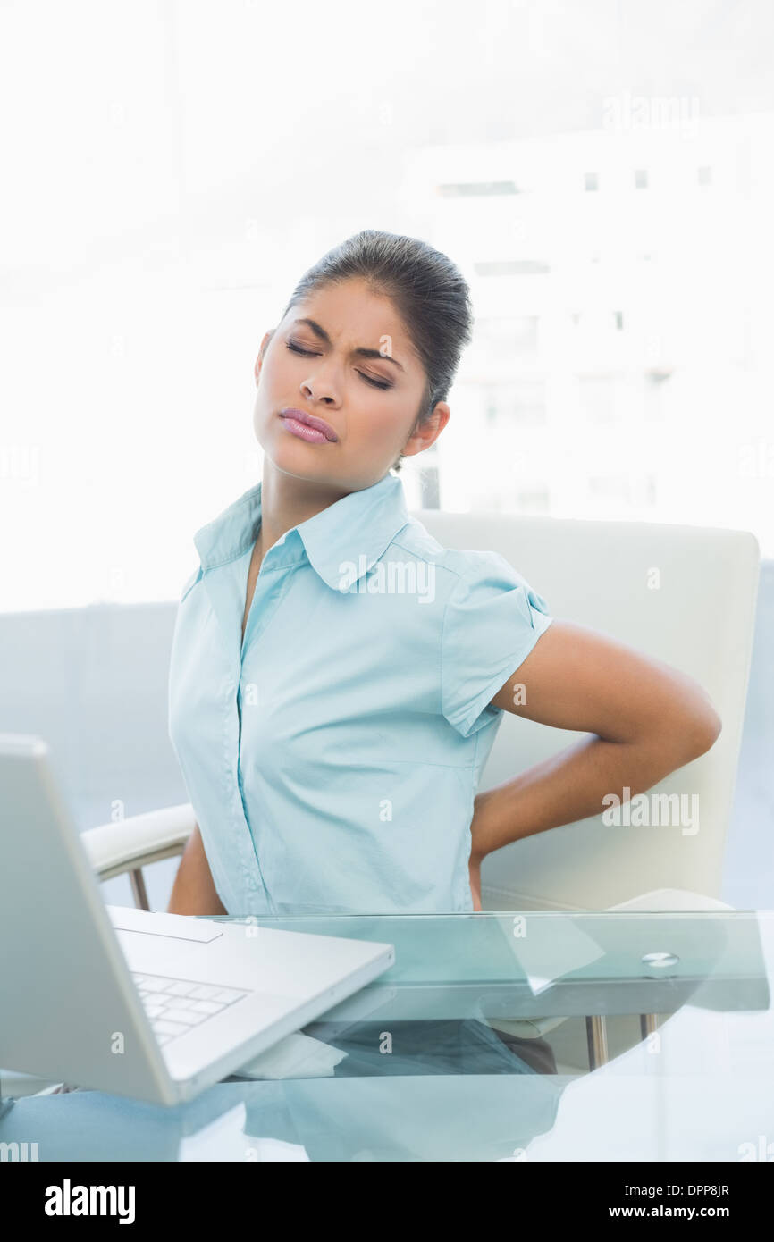 Woman back ache office desk hi-res stock photography and images - Alamy