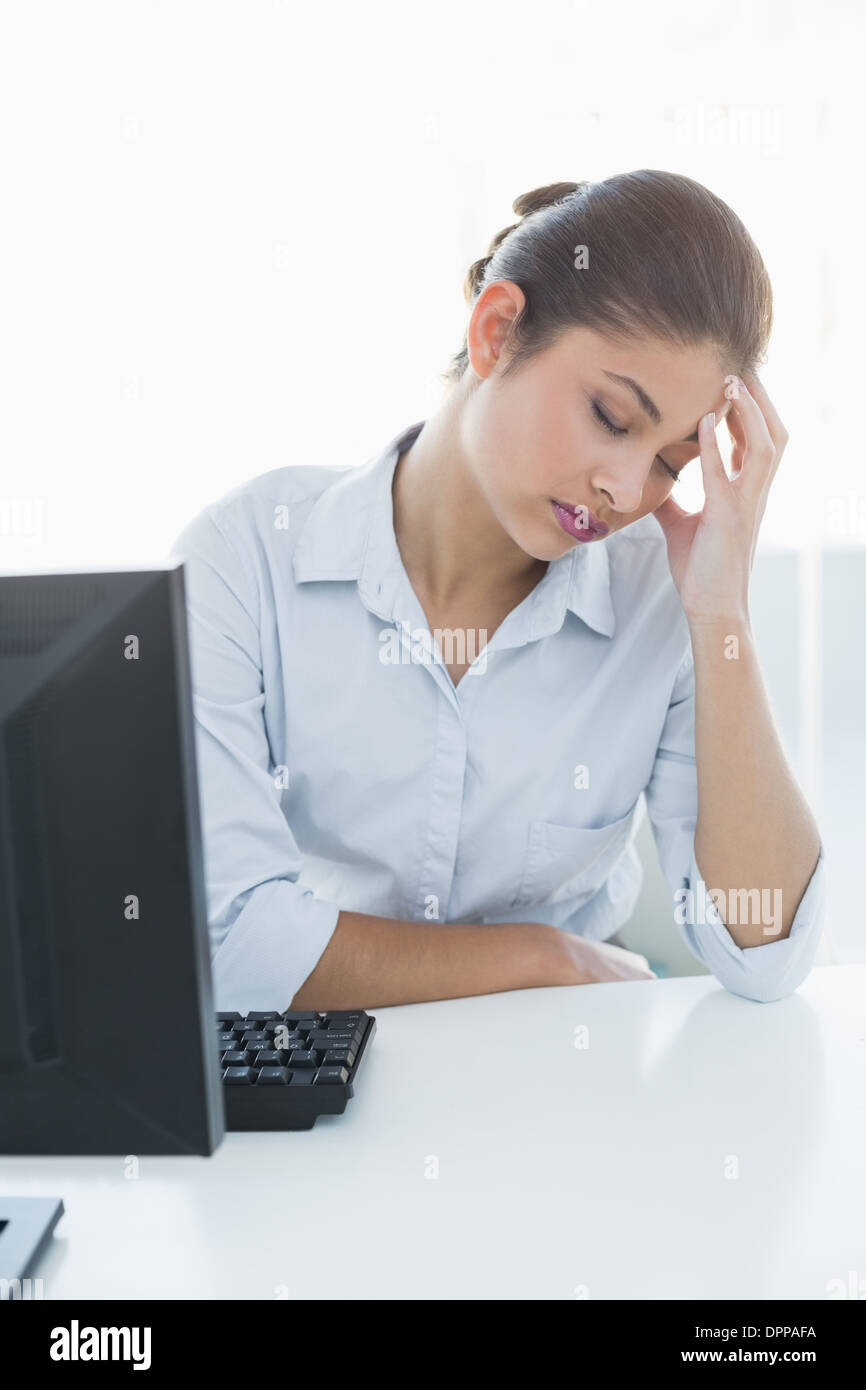 Woman headache from working computer hi-res stock photography and ...