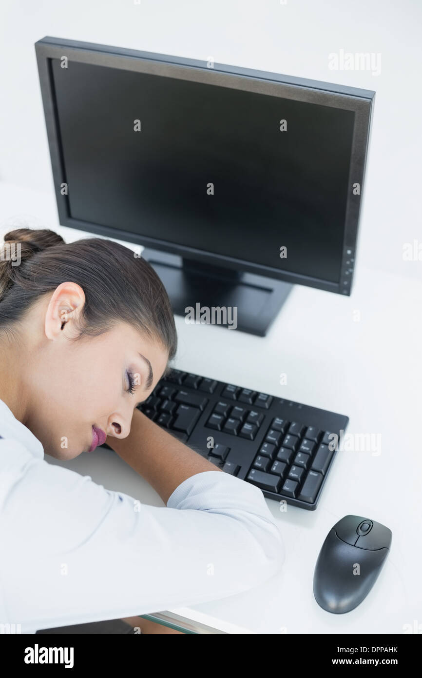 Businesswoman resting head on desk hi-res stock photography and images ...