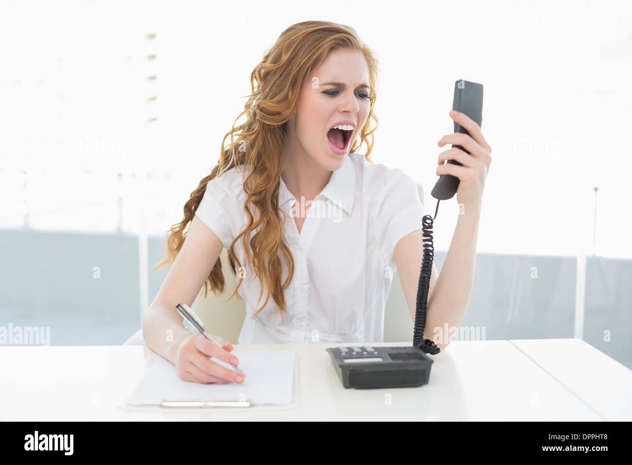 Shouting woman and office hi-res stock photography and images - Alamy