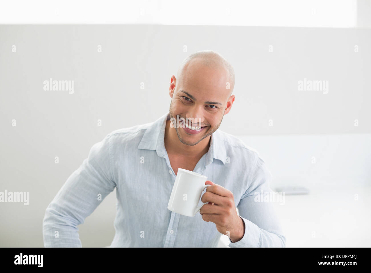 Handsome man cup tea hi-res stock photography and images - Alamy