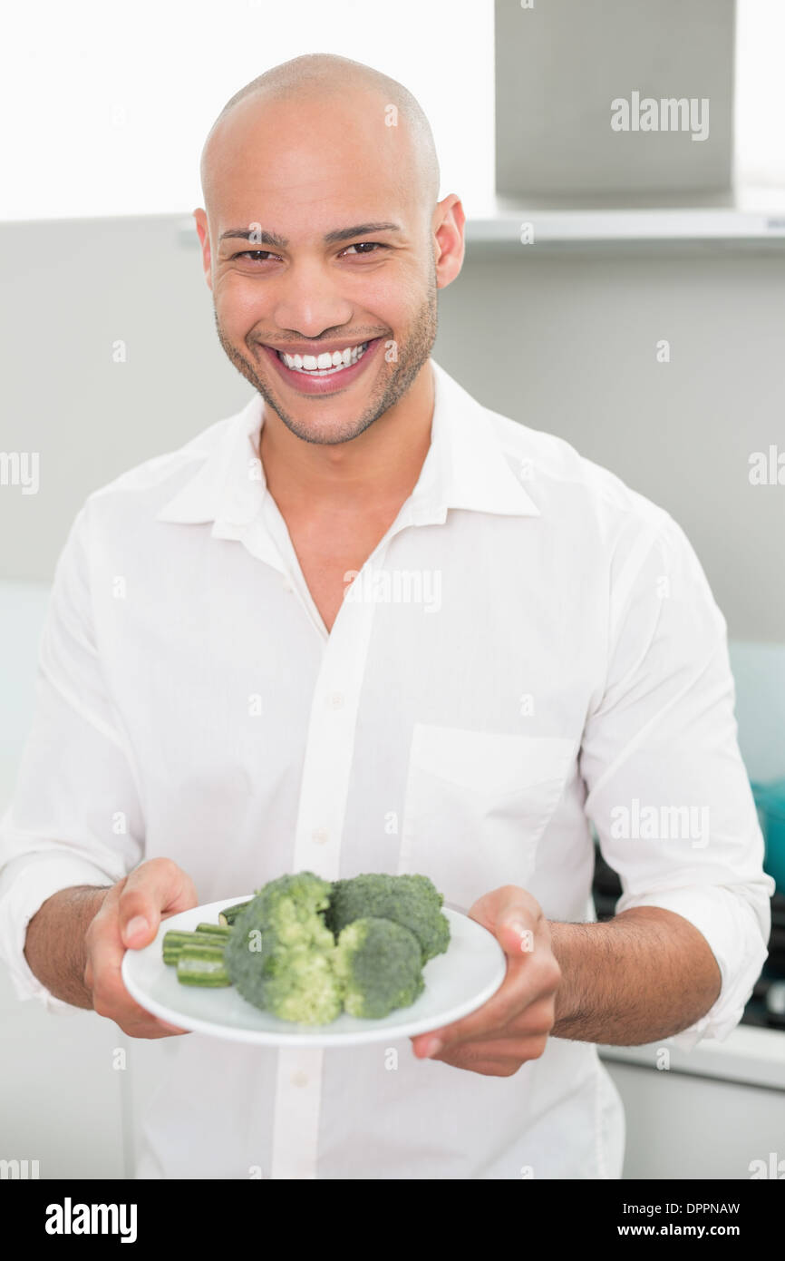 Man holding food plate hi-res stock photography and images - Alamy