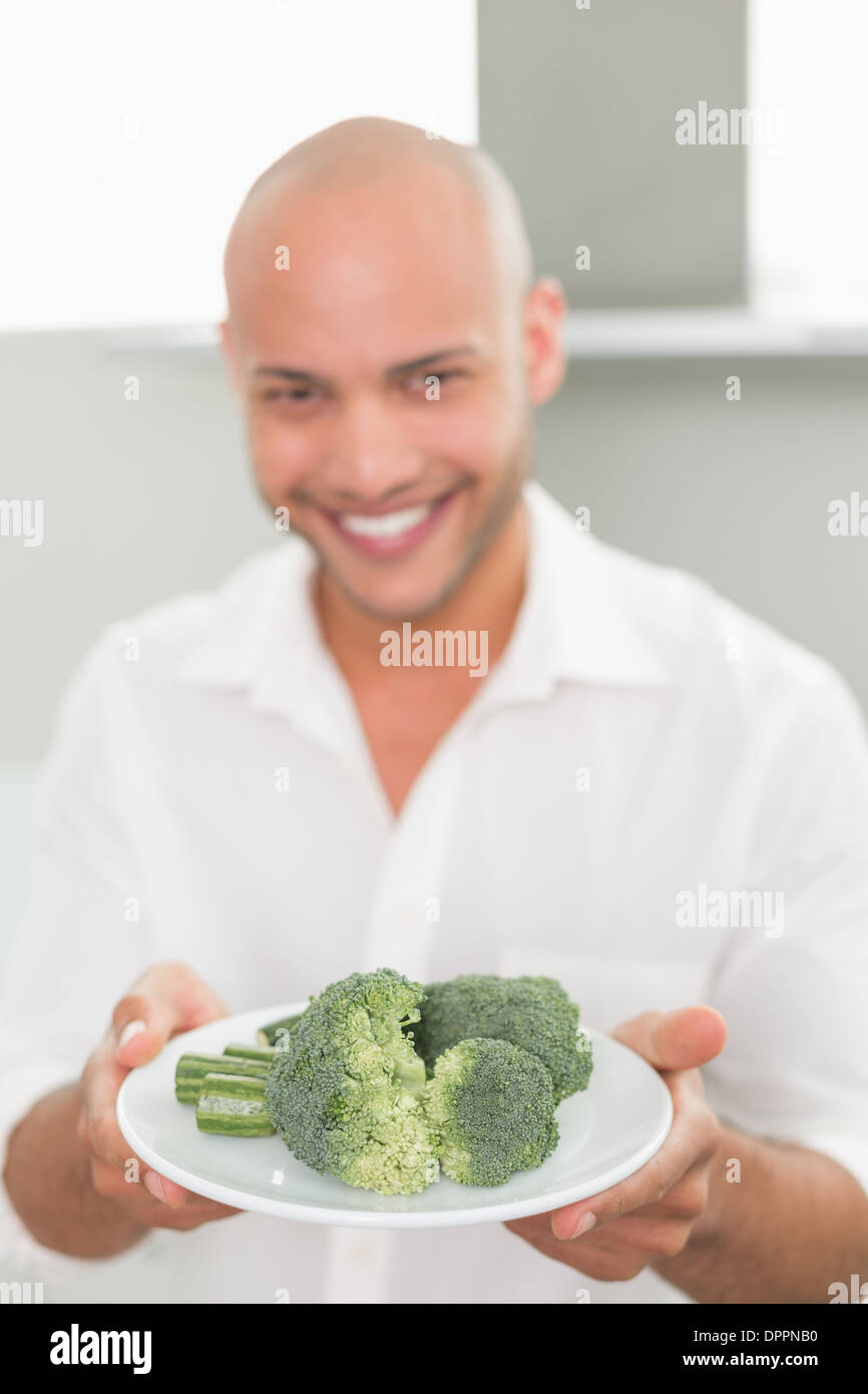 Man eating vegetable handsome hi-res stock photography and images - Alamy