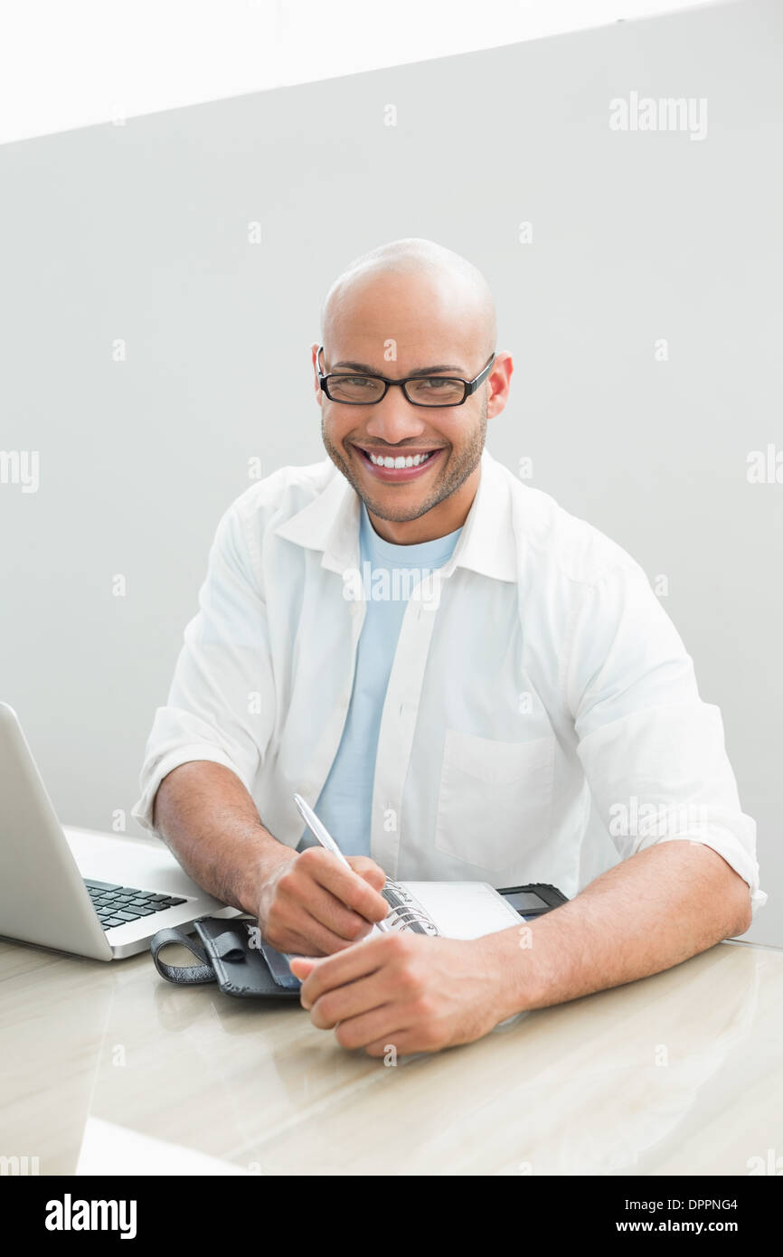 Man writing laptop home hi-res stock photography and images - Alamy