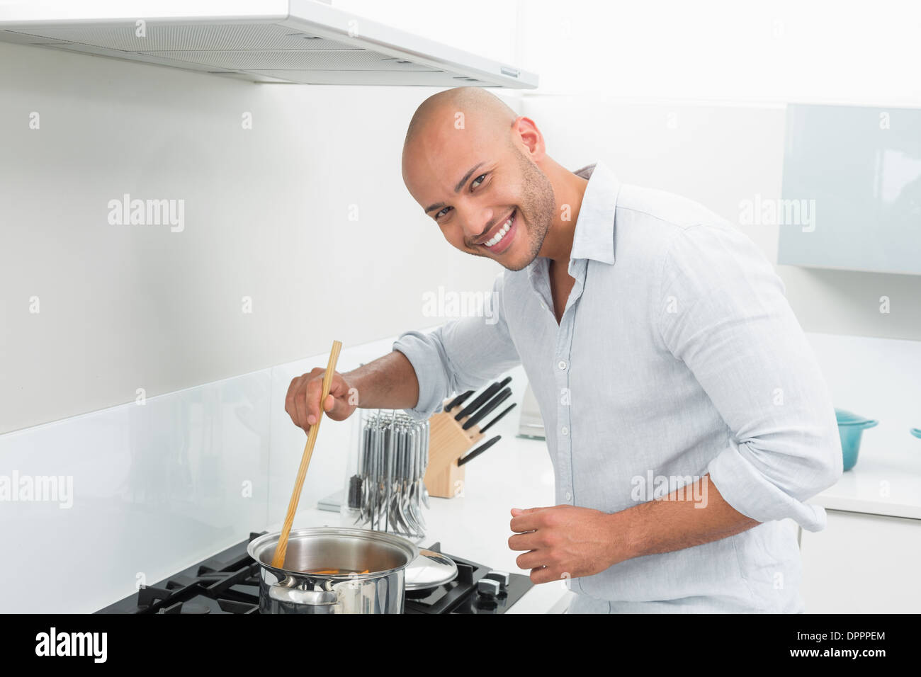Kitchen looking man young man male white male hi-res stock photography ...