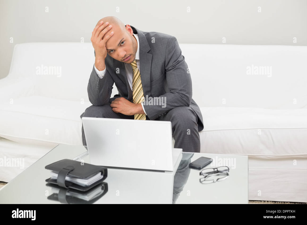 Hand holding his head hi-res stock photography and images - Alamy