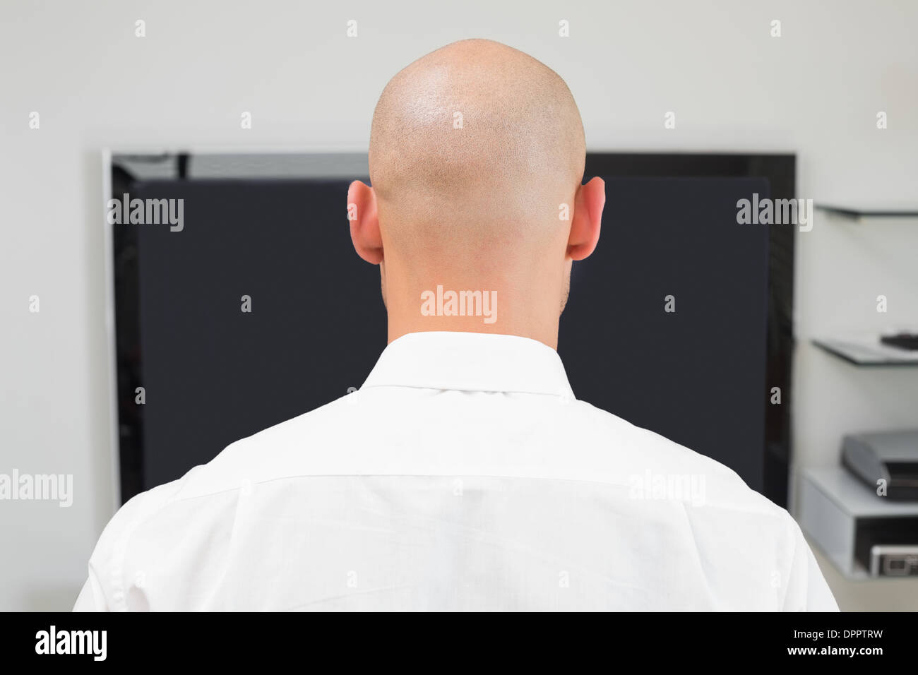 Close up rear view of a bald man using computer Stock Photo - Alamy