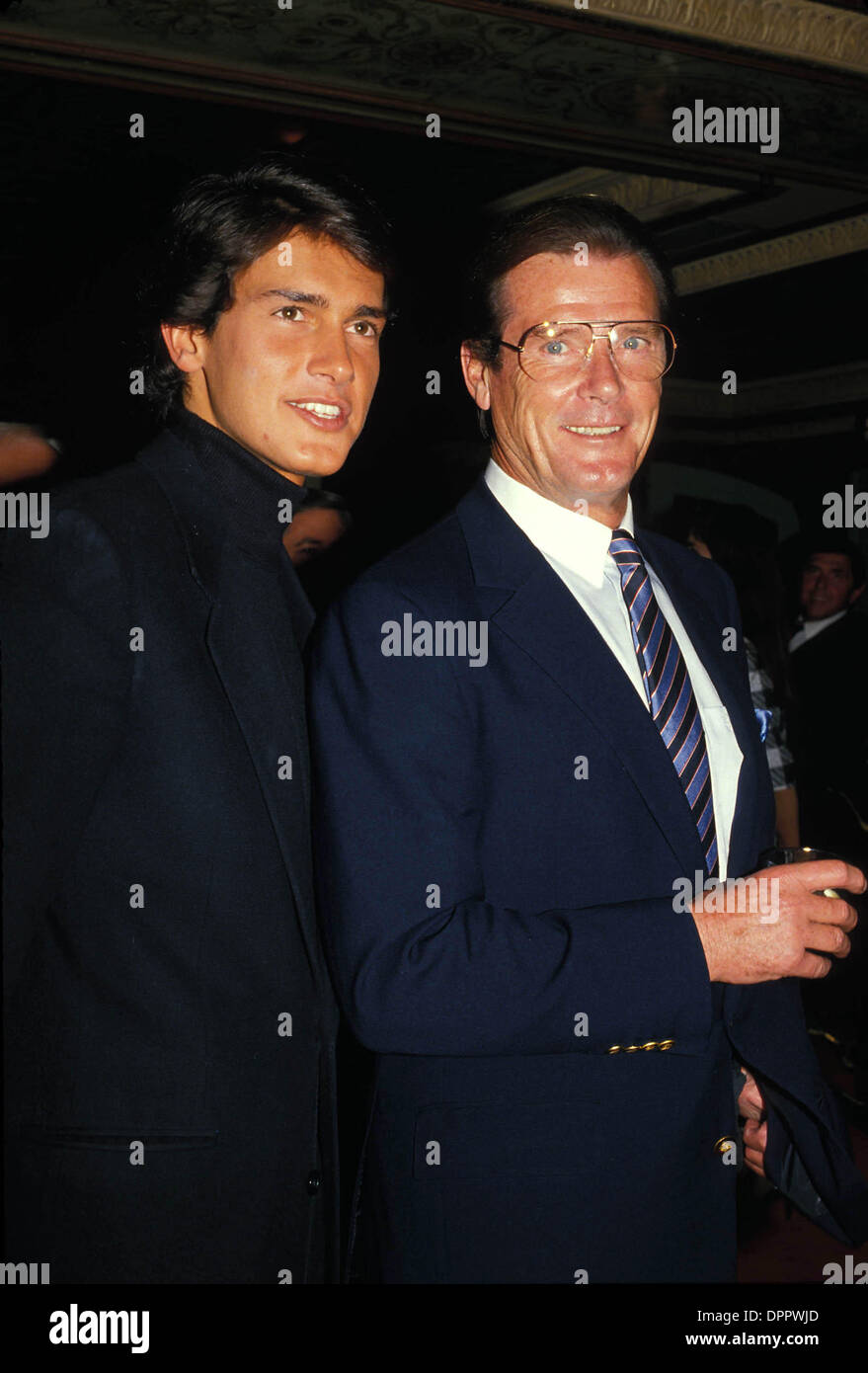 Mar. 30, 2006 - ROGER MOORE AND SON GEOFFREY12-1987. MICHELSON- PHOTOS ...