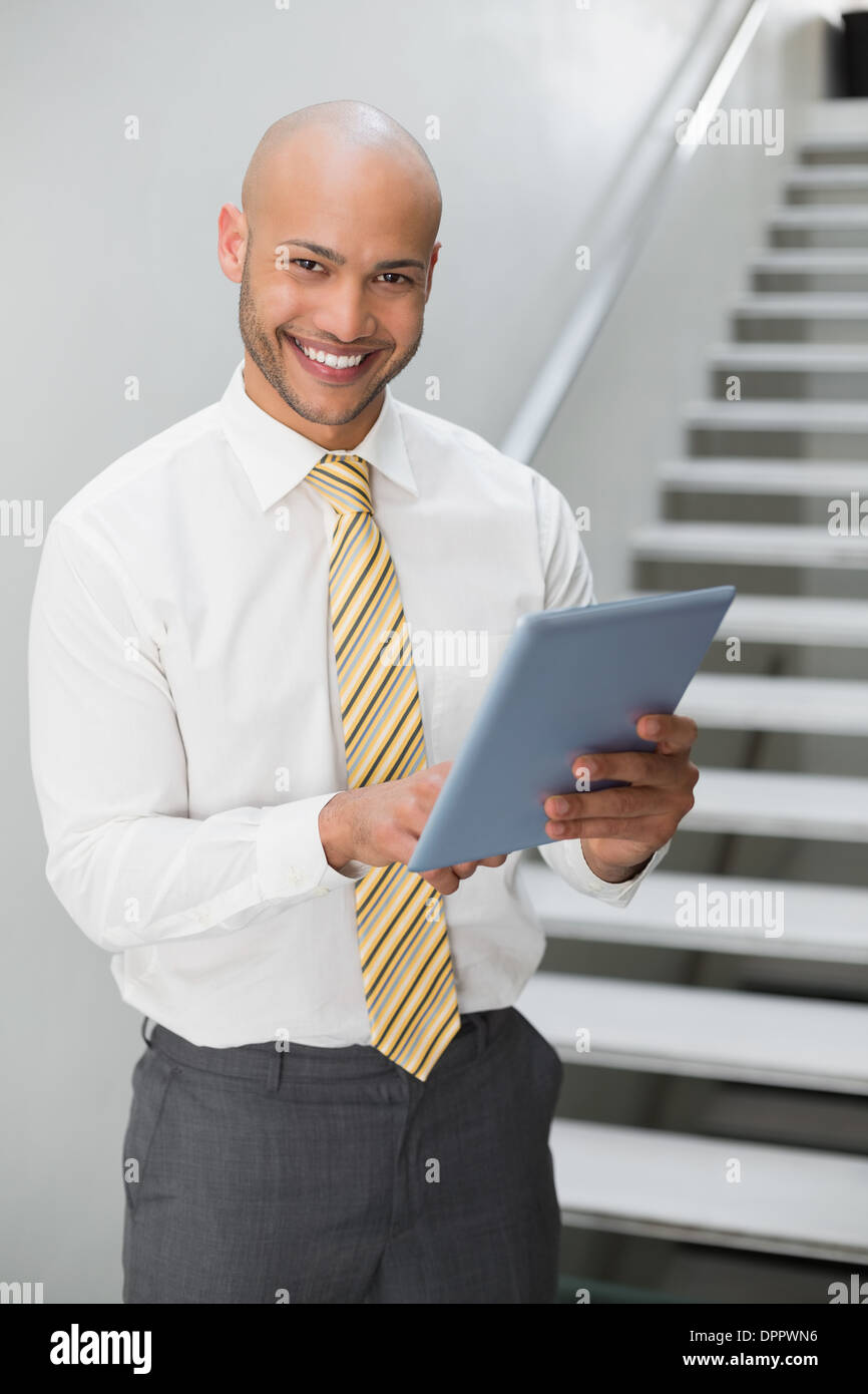 Smiling young businessman digital hi-res stock photography and images ...