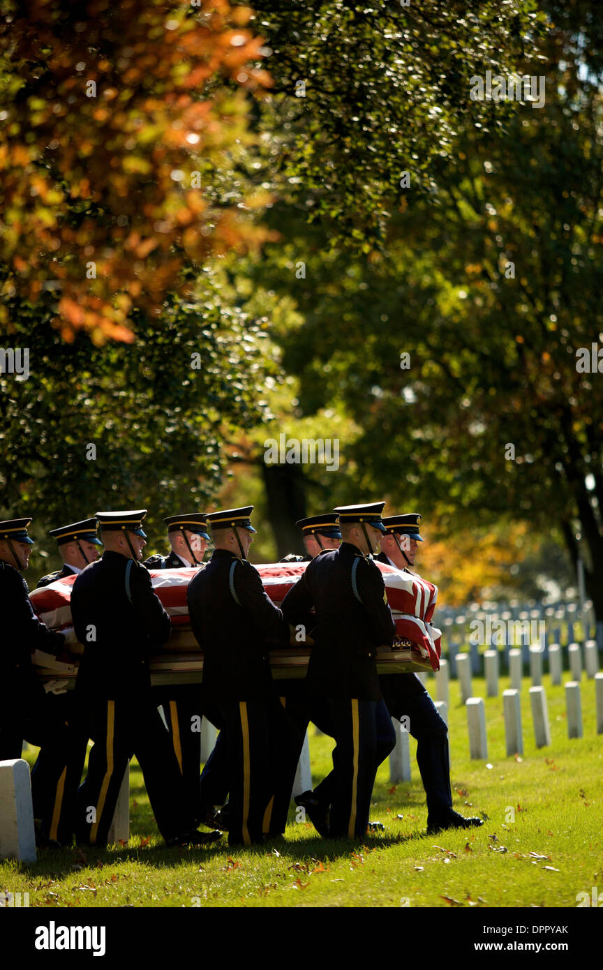 Oct 25, 2006 - Arlington, Virginia, U.S. - A casket team carries a ...