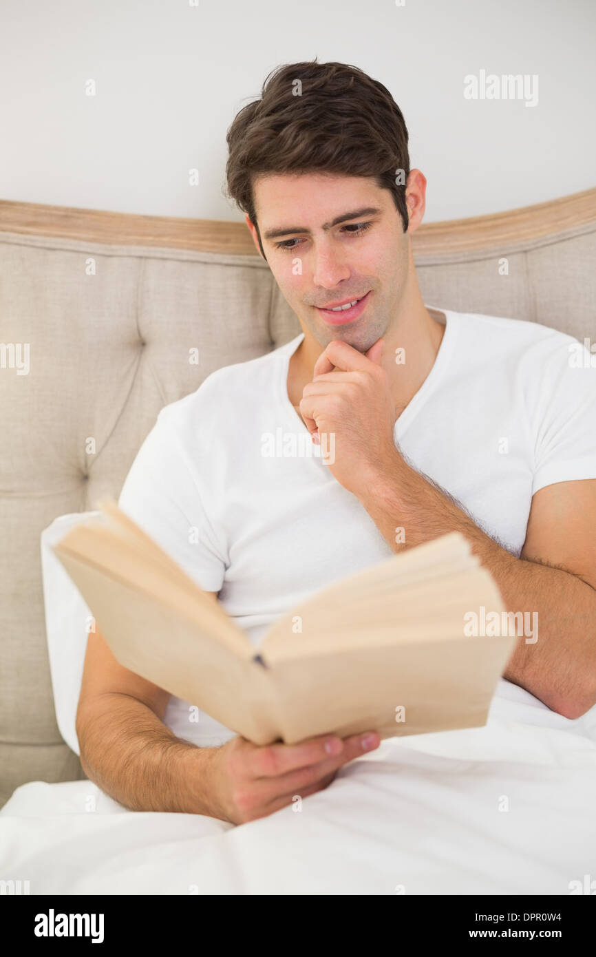 Relaxed young man holding hi-res stock photography and images - Alamy