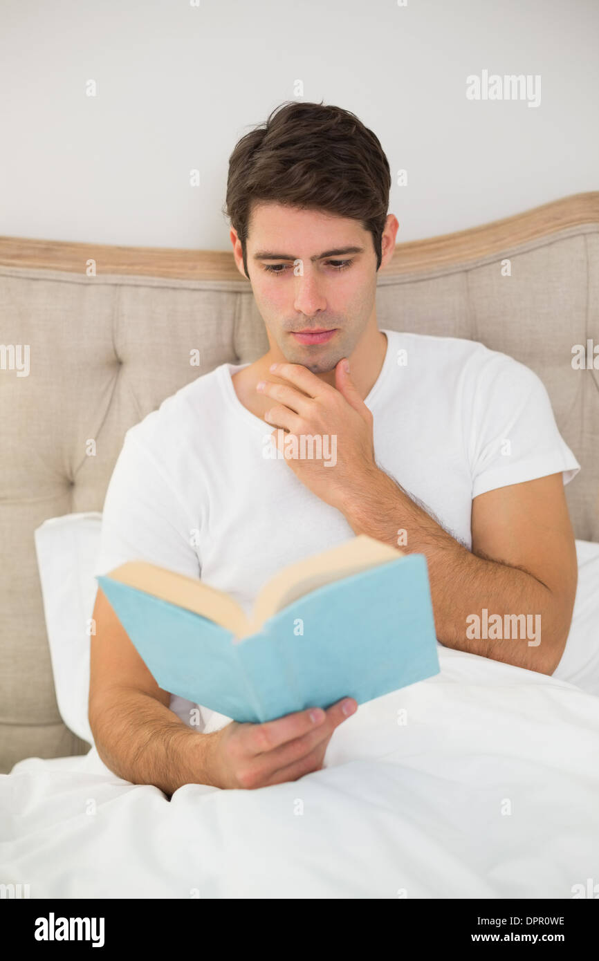 Relaxed young man holding hi-res stock photography and images - Alamy