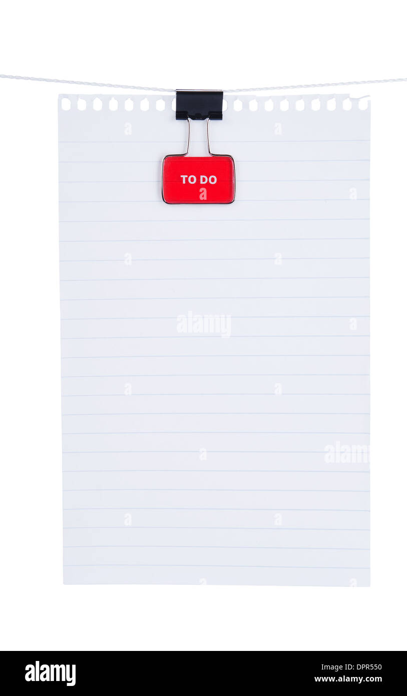 Blank note paper with red binder clip isolated on white background ...