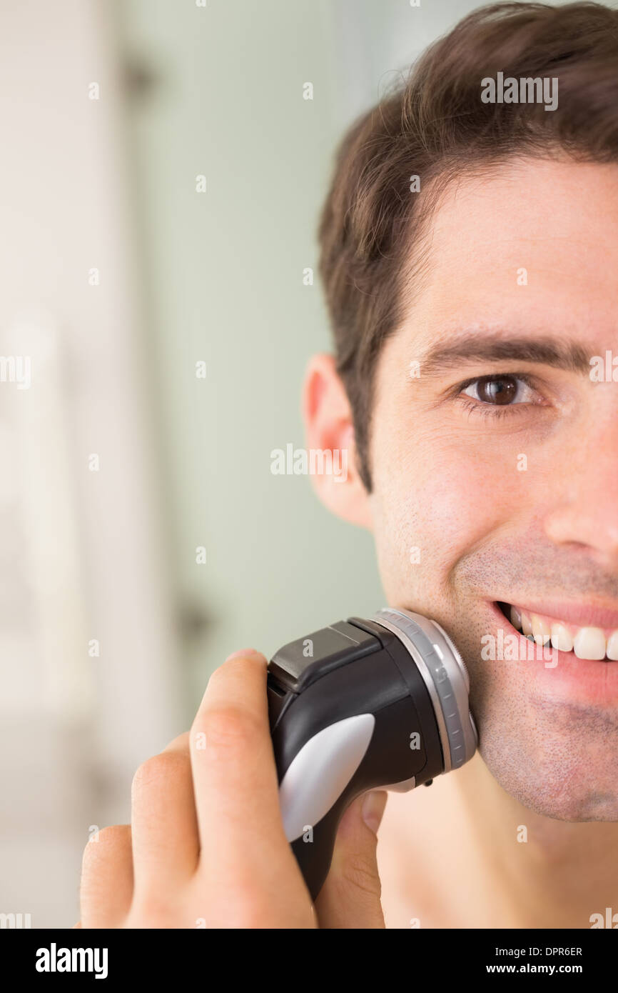 Hand holding electric shaver hi-res stock photography and images - Alamy