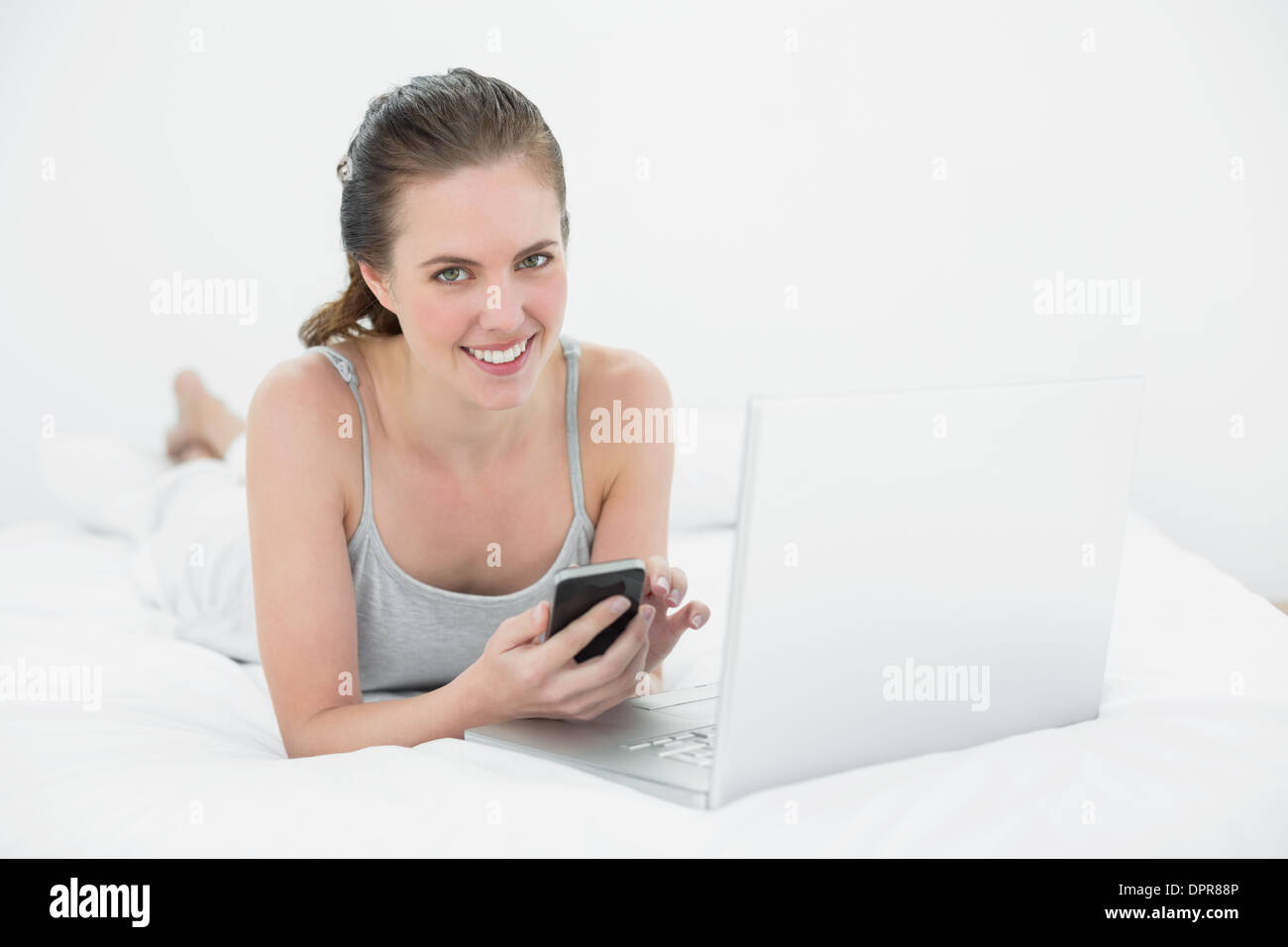 Beautiful young woman pressing laptop hi-res stock photography and ...