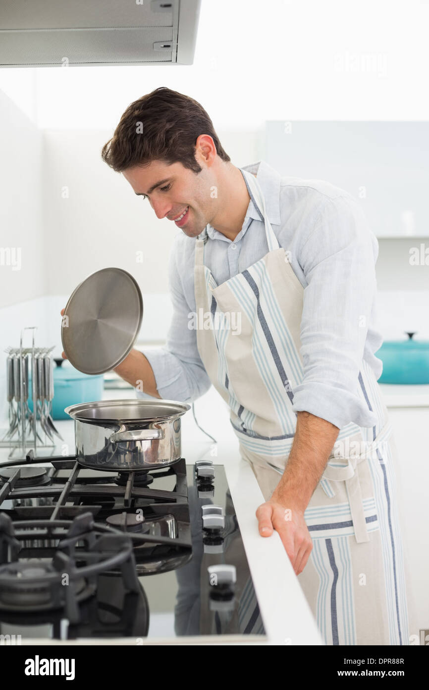 Kitchen looking man young man male white male hi-res stock photography ...