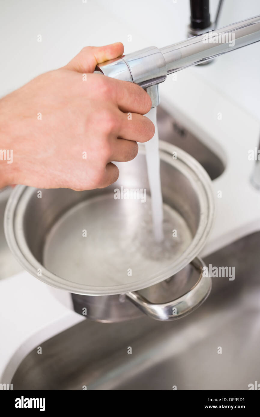 Hand filling hi-res stock photography and images - Alamy