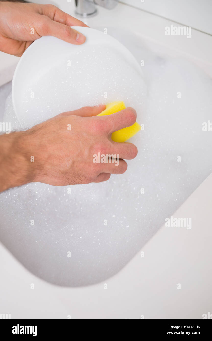 Doing the dishes hi-res stock photography and images - Alamy
