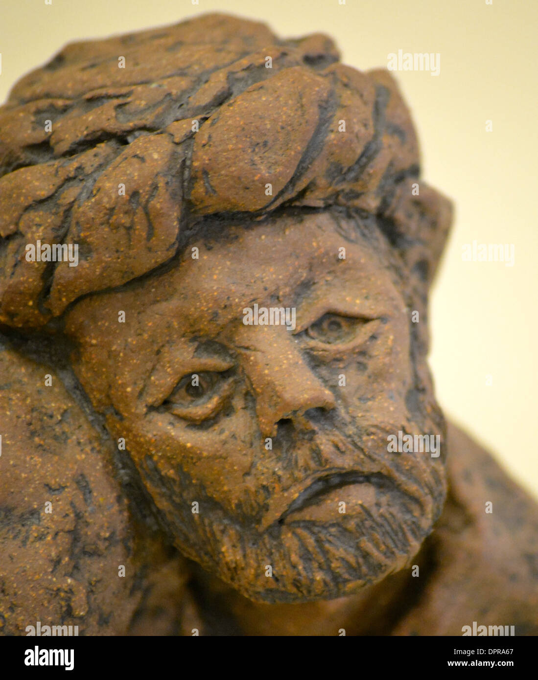 Figurine of two people comforting each other Stock Photo - Alamy