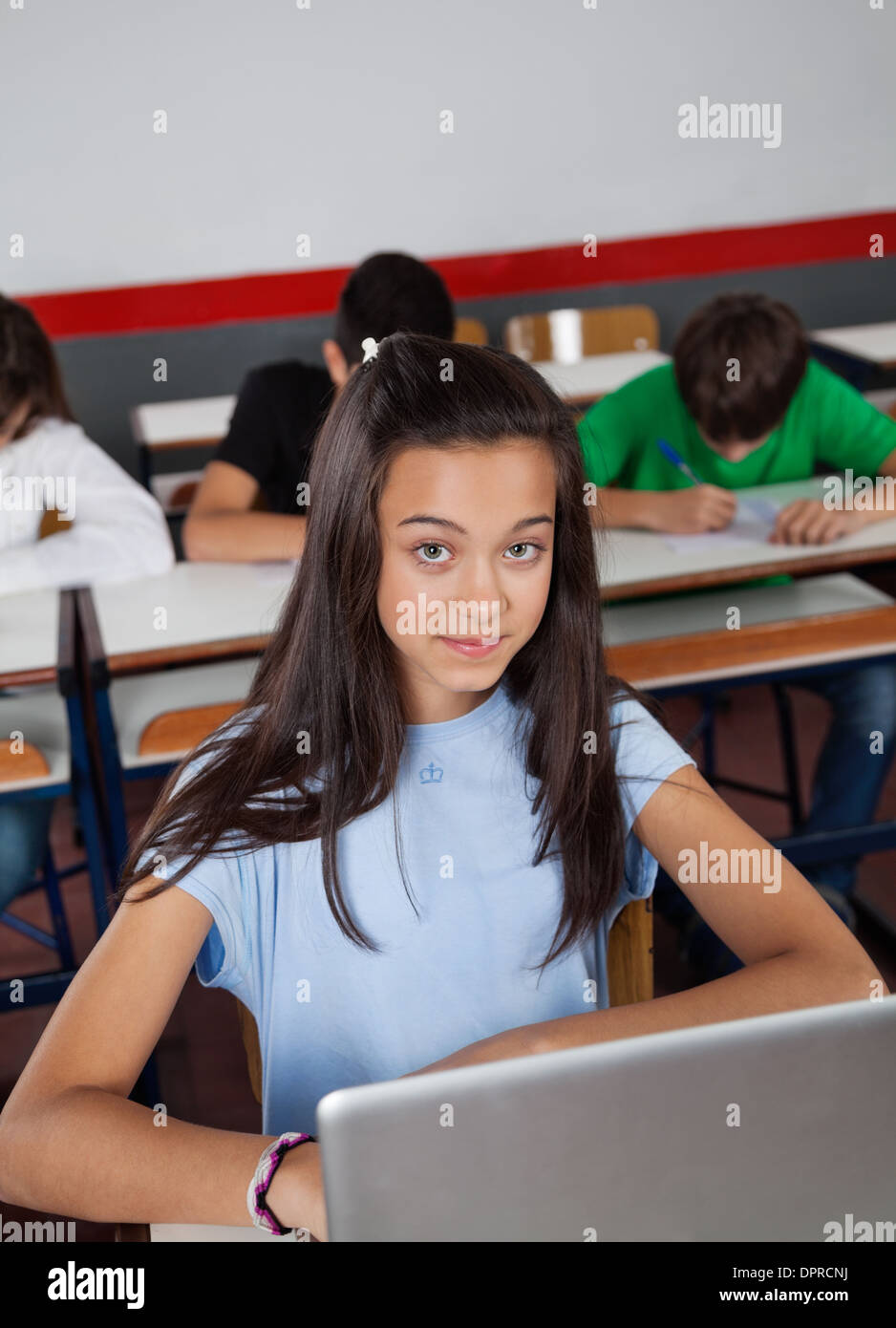 Schoolgirl classroom brunette hi-res stock photography and images - Alamy