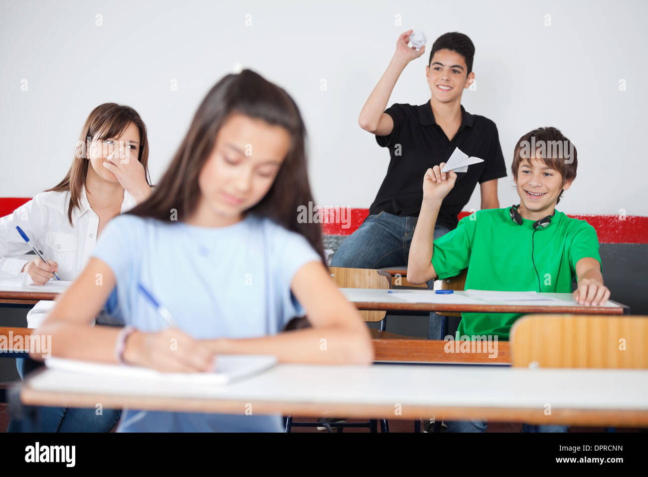 Throwing book classroom hi-res stock photography and images - Alamy