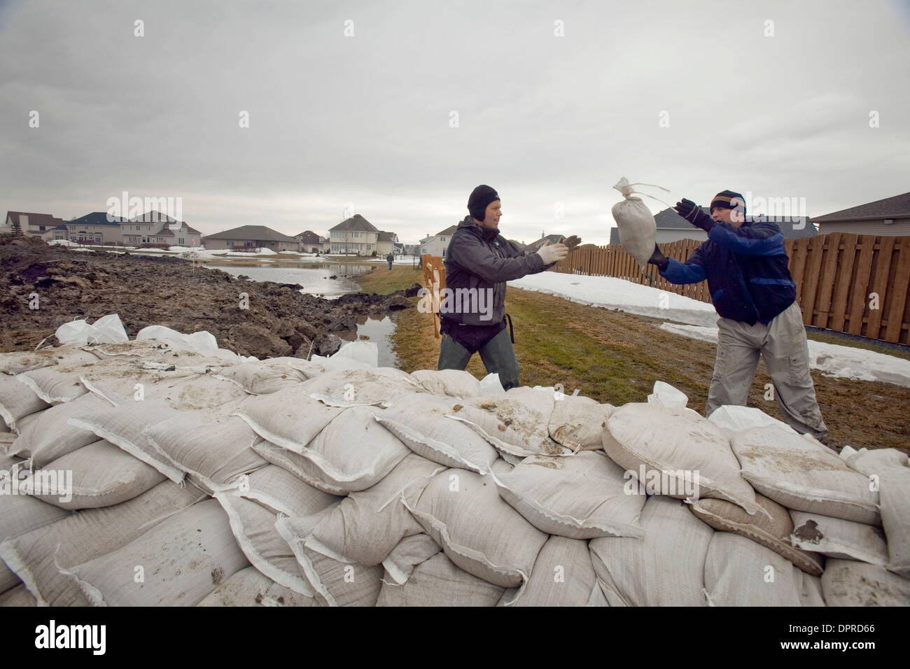 March 24, 2009 - Fargo, North Dakota, USA - Jim DeBoer, right, and Chad ...