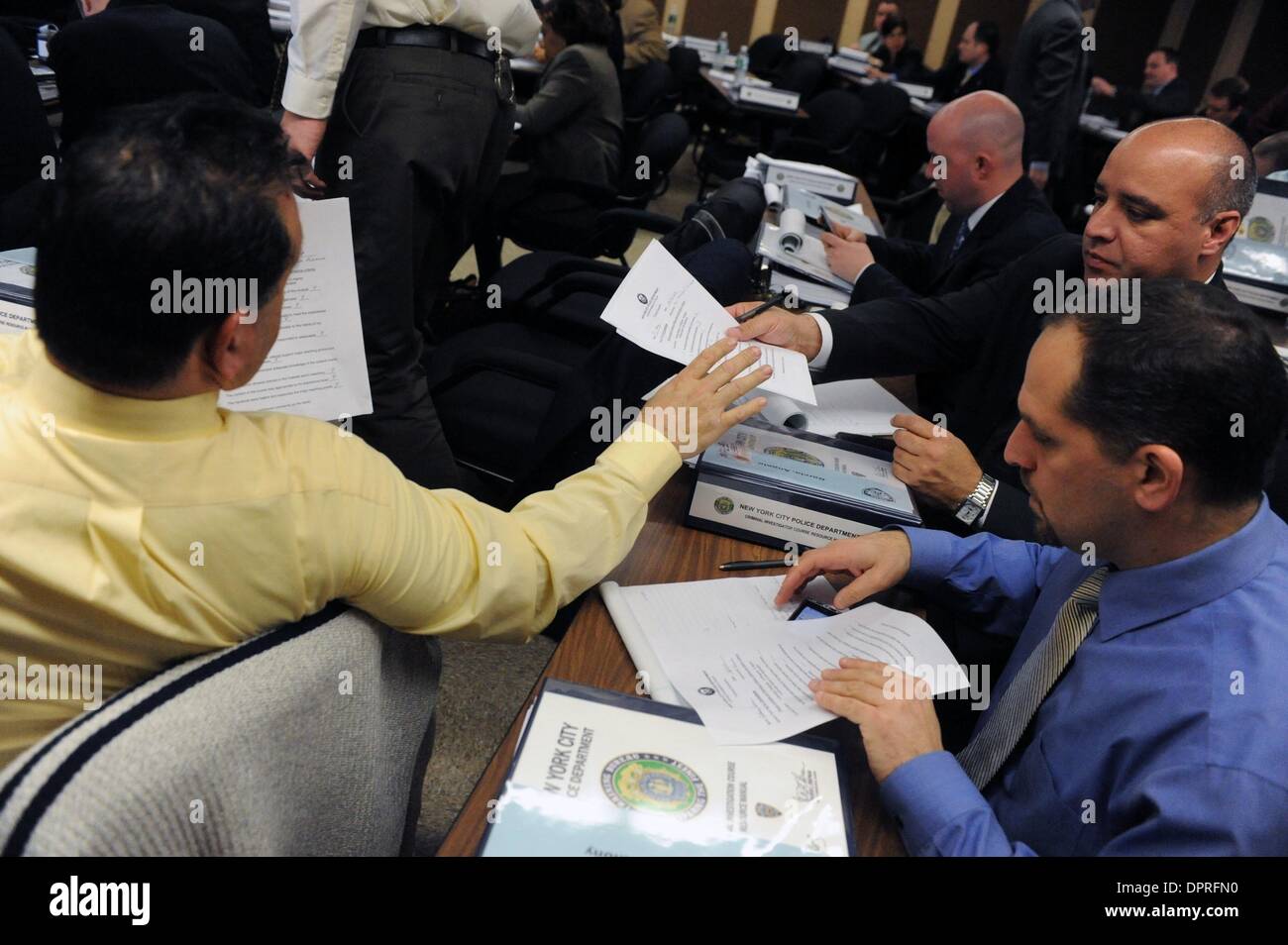 Mar 04, 2009 - Manhattan, New York, USA - Detectives listen to a ...