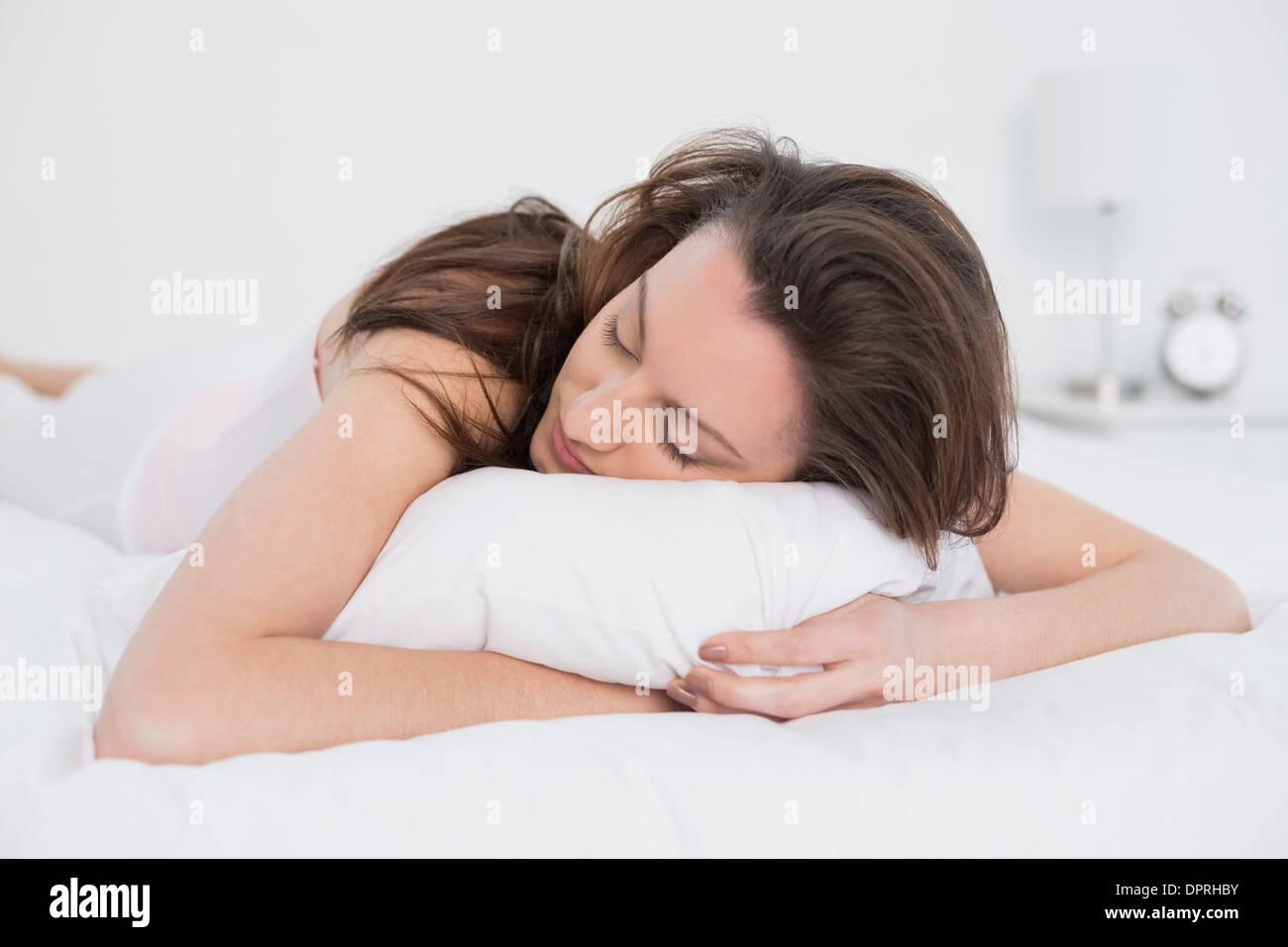 Close up of pretty woman sleeping in bed Stock Photo - Alamy