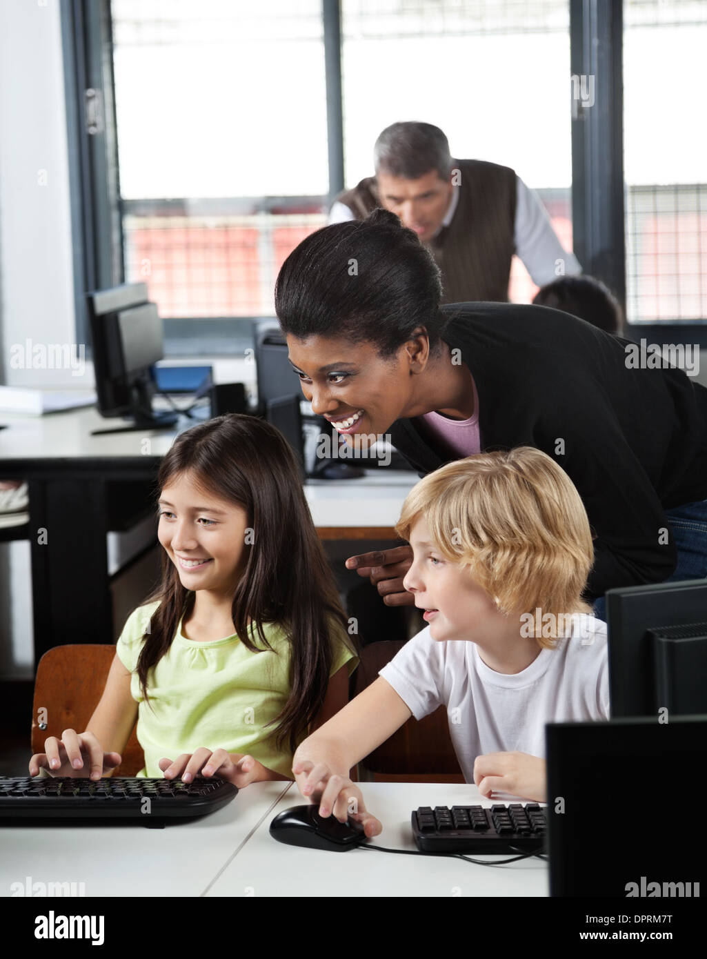 African american student in computer lab hi-res stock photography and ...