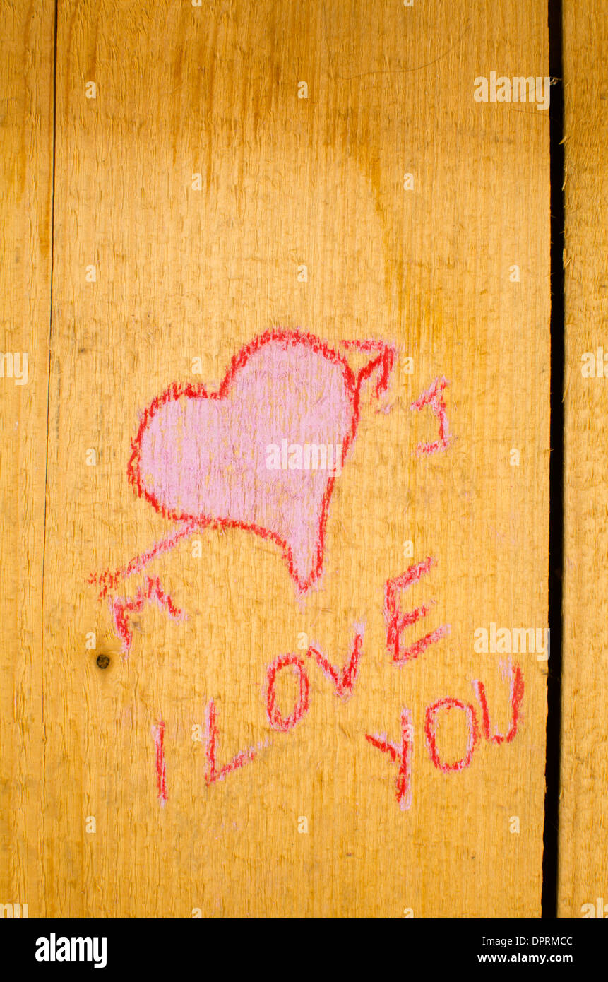 Valentines graffiti on the planks of an old wooden door Stock Photo - Alamy