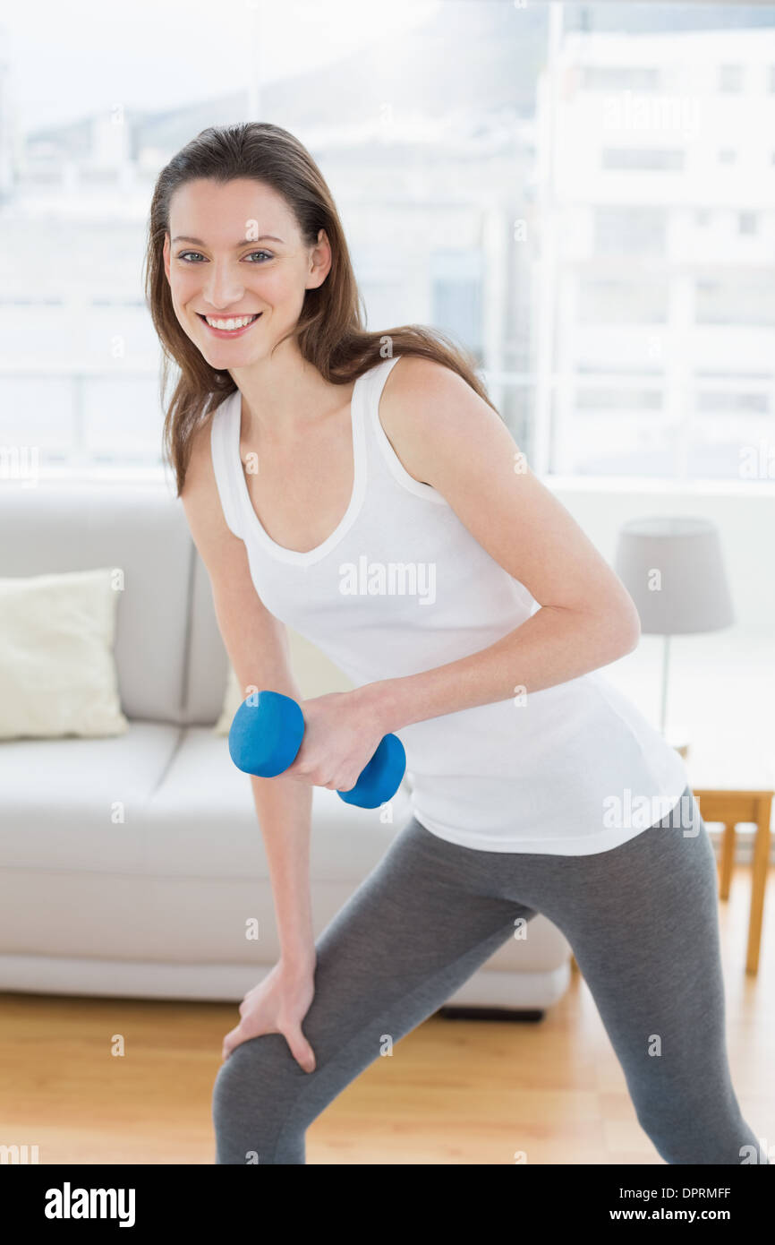 Fit brunette woman exercising hi-res stock photography and images - Alamy