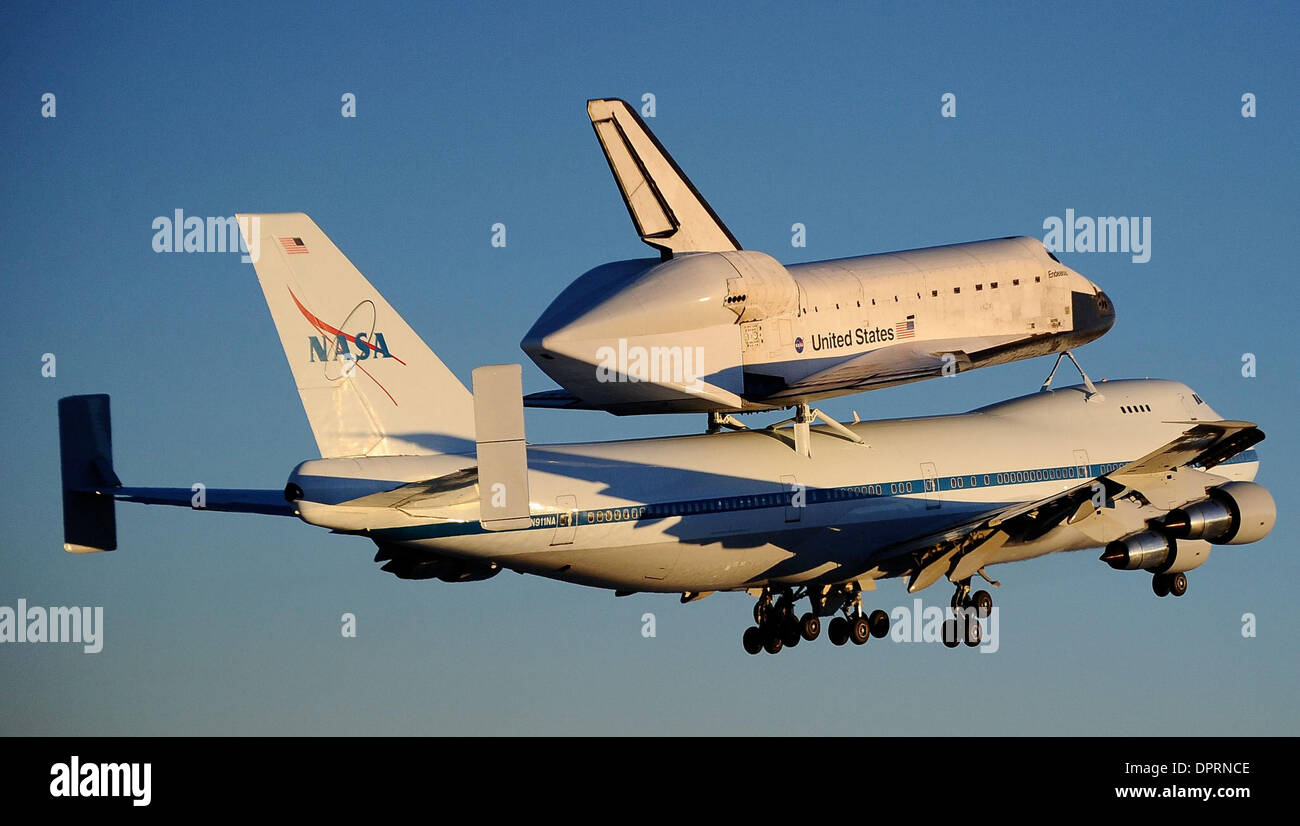 Space shuttle Endeavour's piggyback ride atop a modified Boeing 747 jet ...
