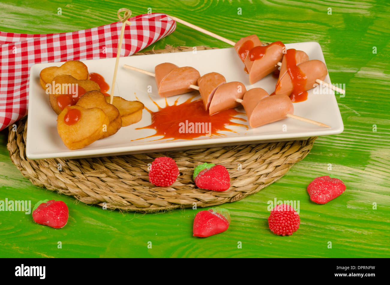Fast food in heart shapes for Valentines day Stock Photo - Alamy