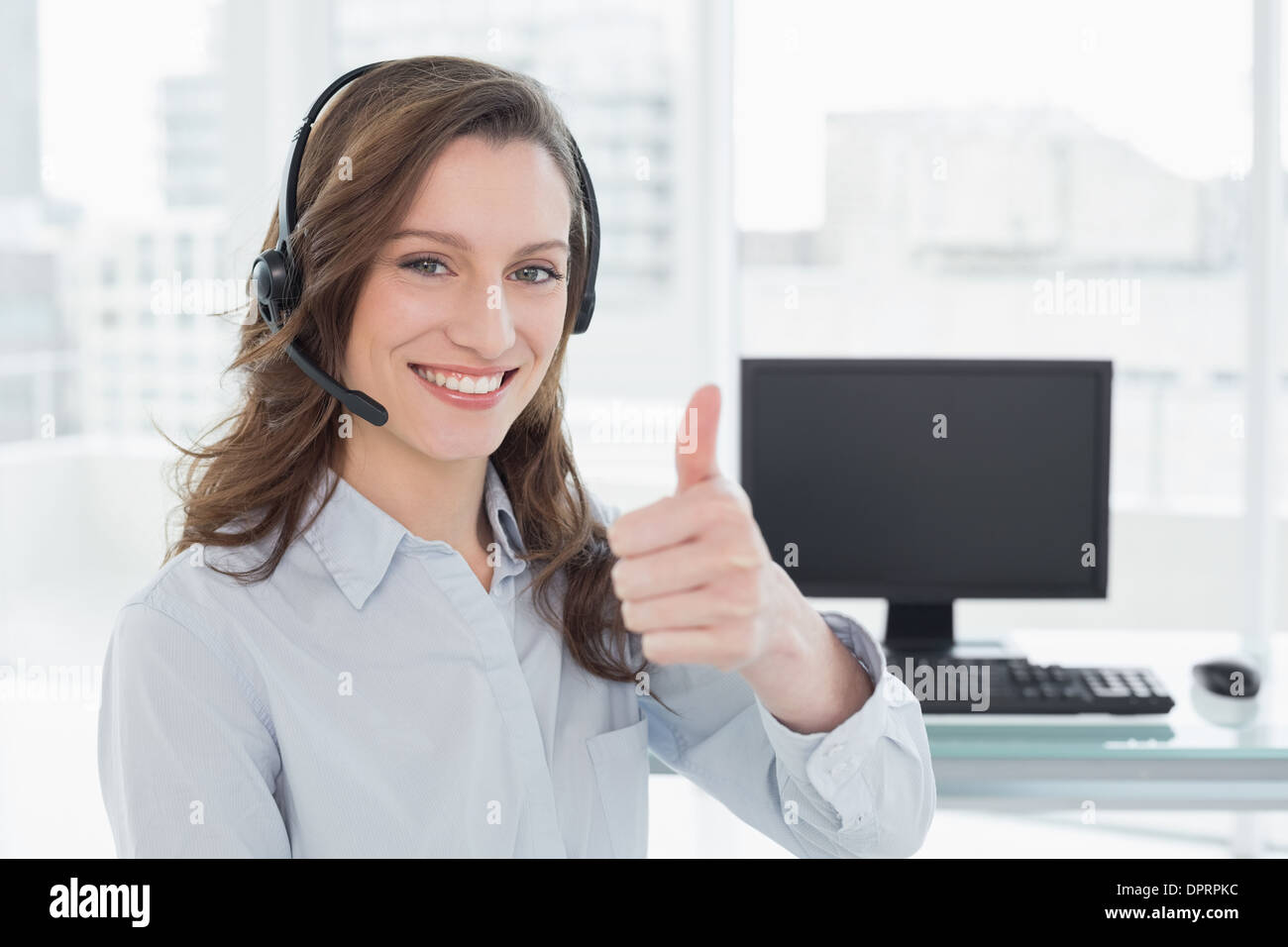 Call center office thumbs hi-res stock photography and images - Alamy
