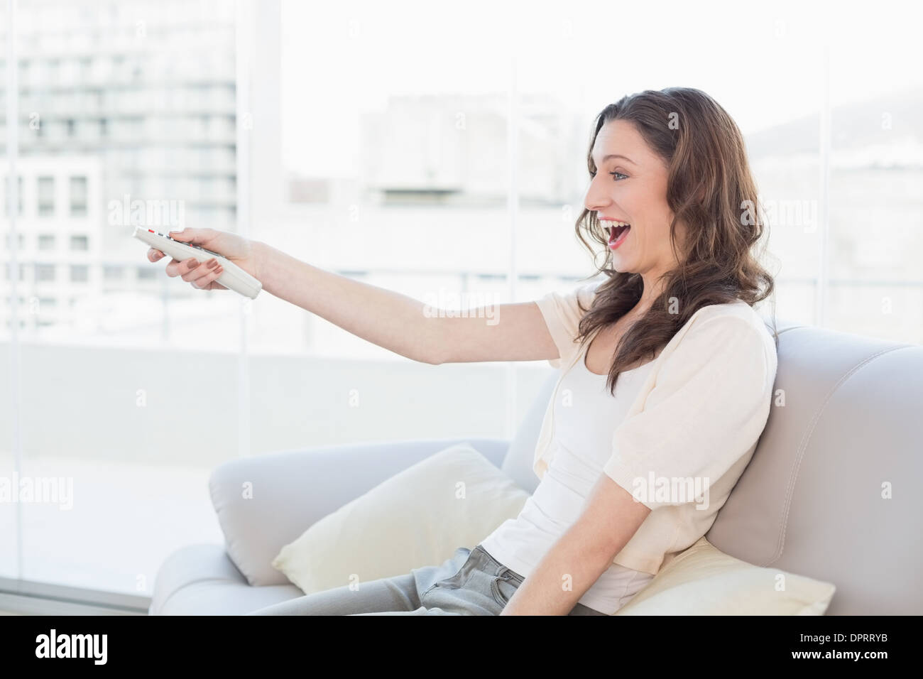 Remote control sitting hi-res stock photography and images - Alamy