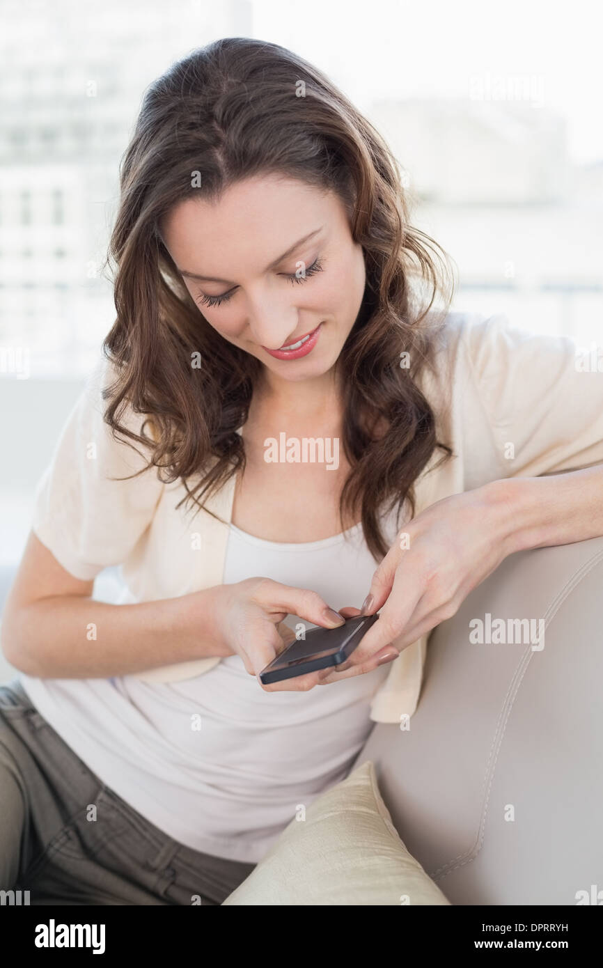 Relaxed pretty young woman typing hi-res stock photography and images ...