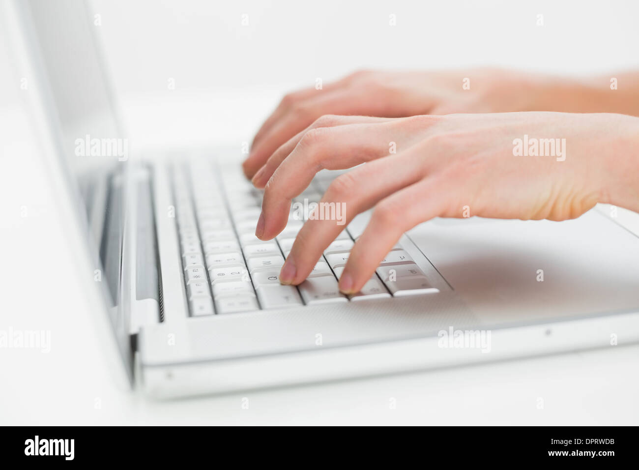 Laptop keyboard female hands typing hi-res stock photography and images ...