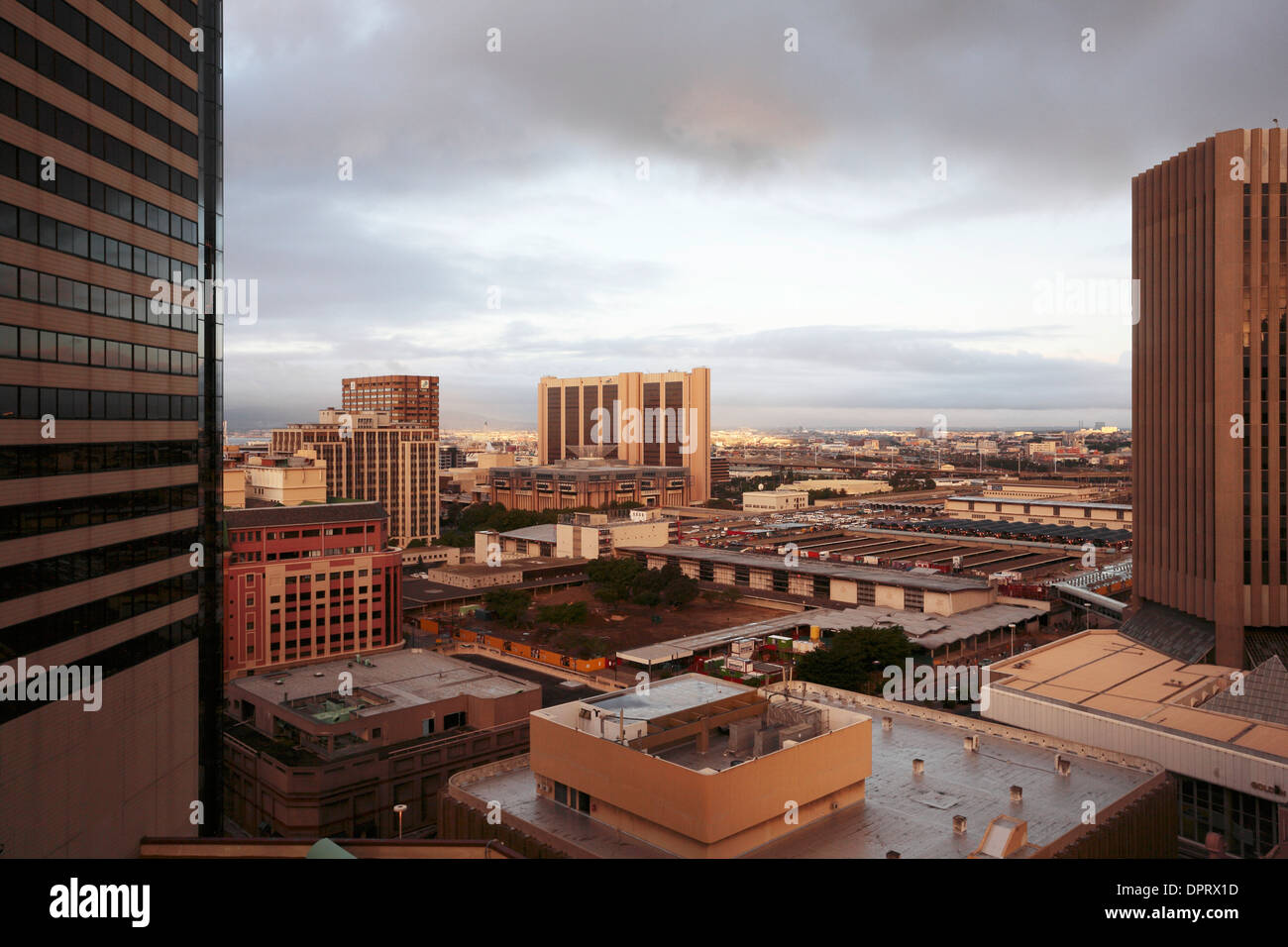 View of Cape Town at sunset showing the Cape Sun building, the train ...