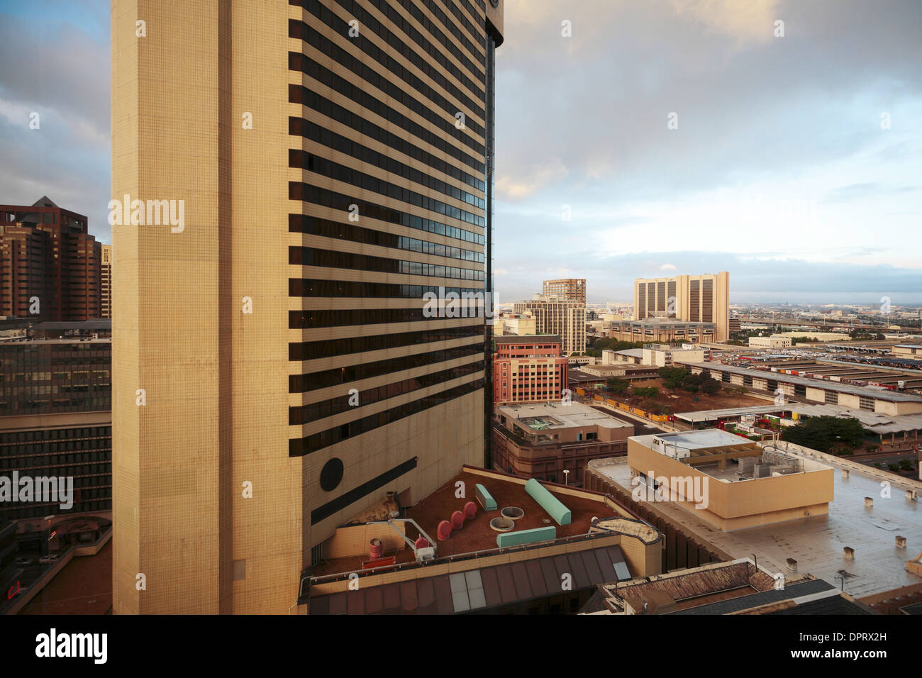 View of Cape Town at sunset showing the Cape Sun building, the train ...