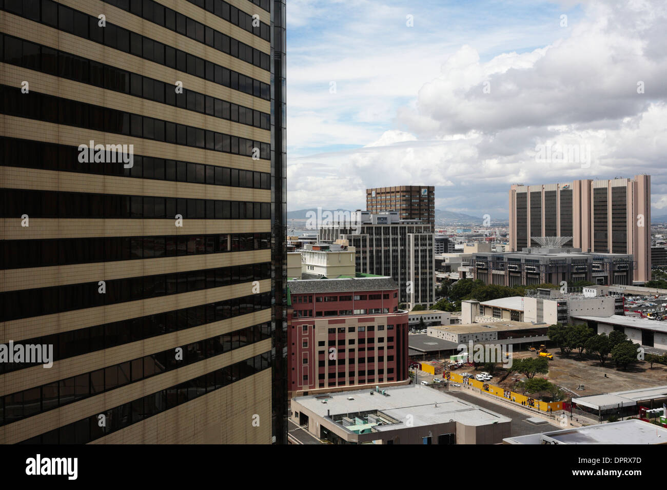 View of Cape Town at sunset showing the Cape Sun building, the train ...