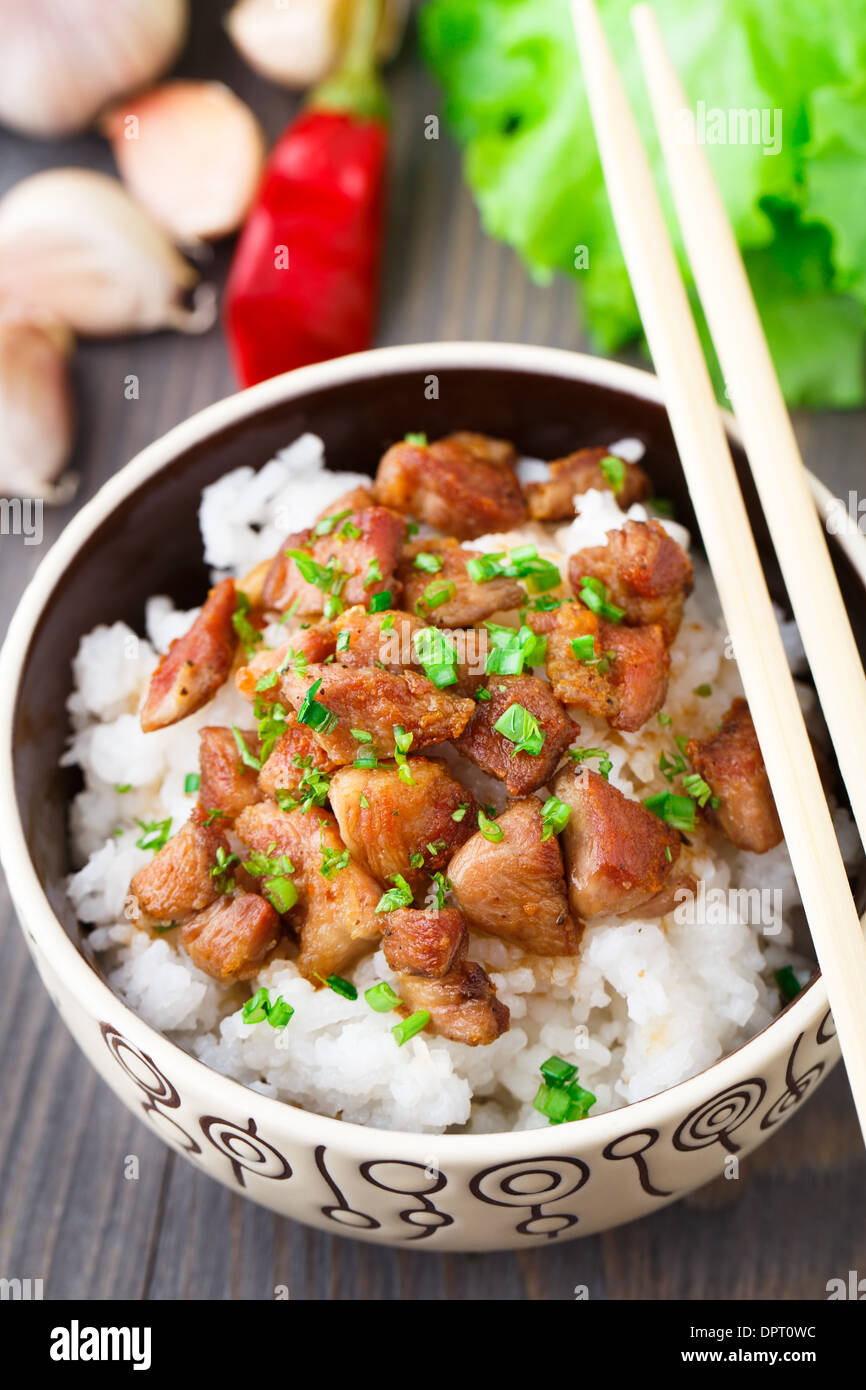 Bowl of rice with meat Stock Photo - Alamy