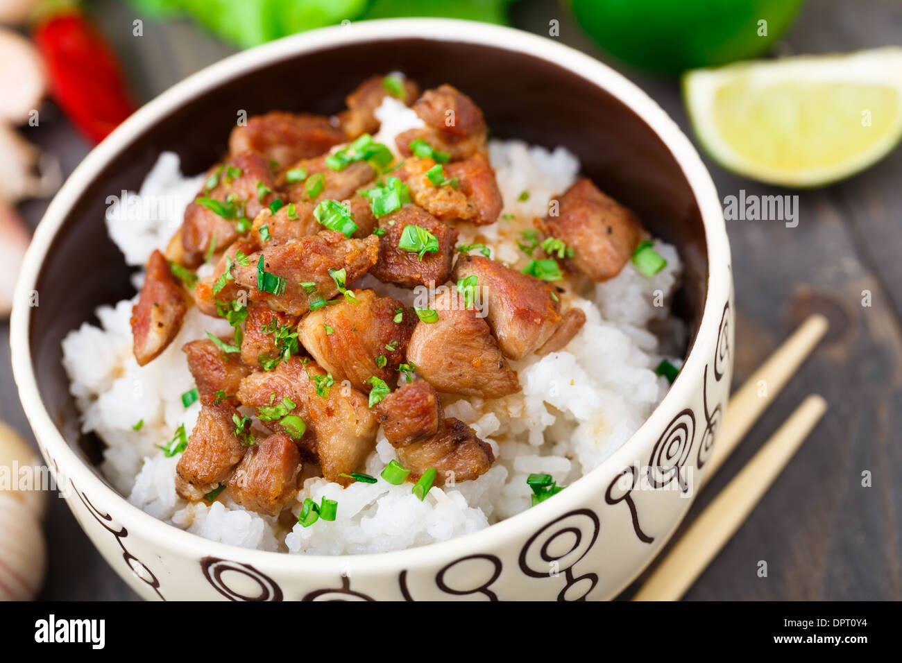 Bowl of rice with meat Stock Photo - Alamy