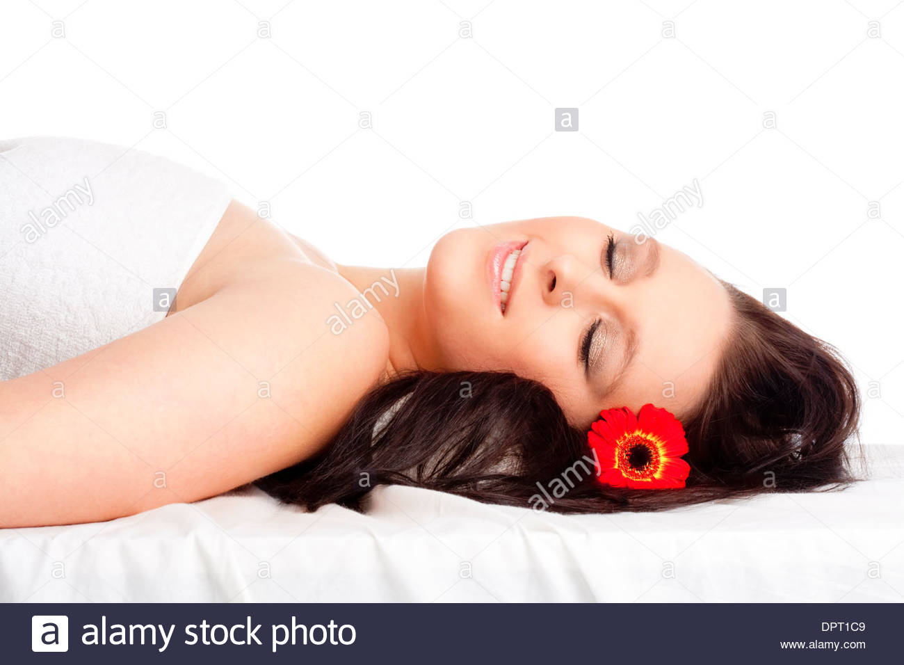 Young woman lying on back hi-res stock photography and images - Alamy