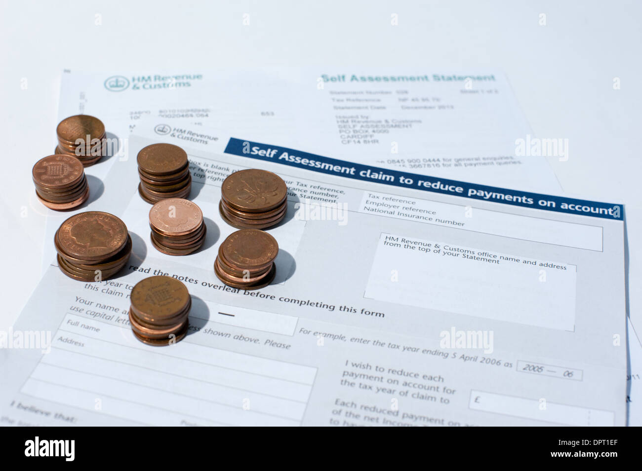 Piles Of Pennies And Coins On A Self assessment HM Revenue And Customs piles-of-pennies-and-coins-on-a-self-assessment-hm-revenue-and-customs