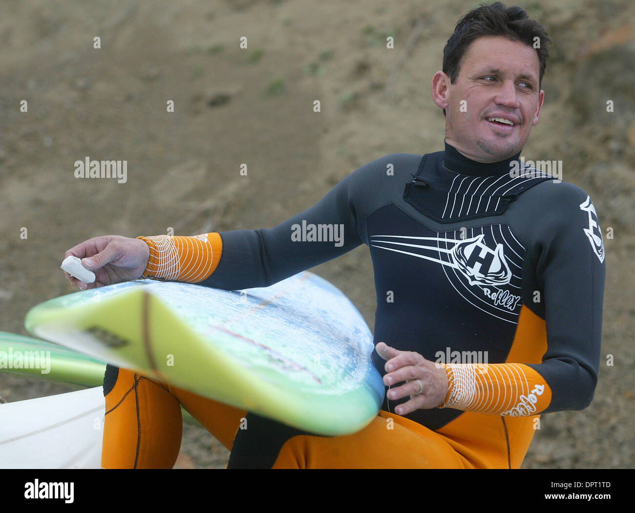 Former Maverkicks champion Darryl Virostko waxes his board before ...